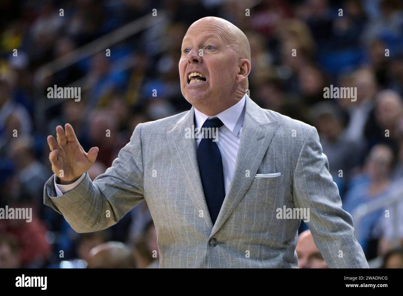 UCLA coach Mick Cronin gestures from the bench during the second half ...