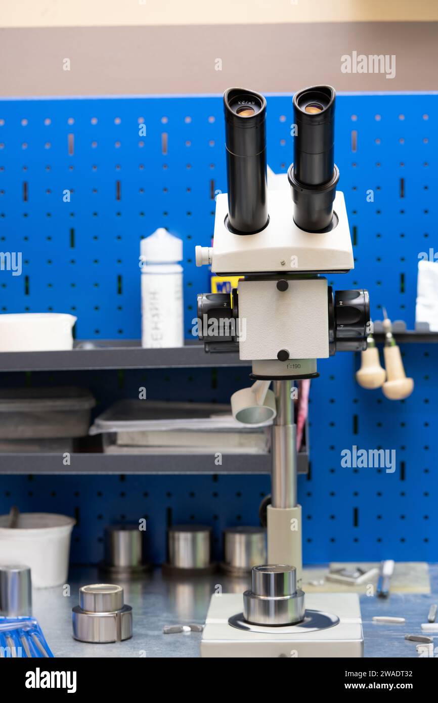 laboratory workplace for coin billet preparation Stock Photo - Alamy