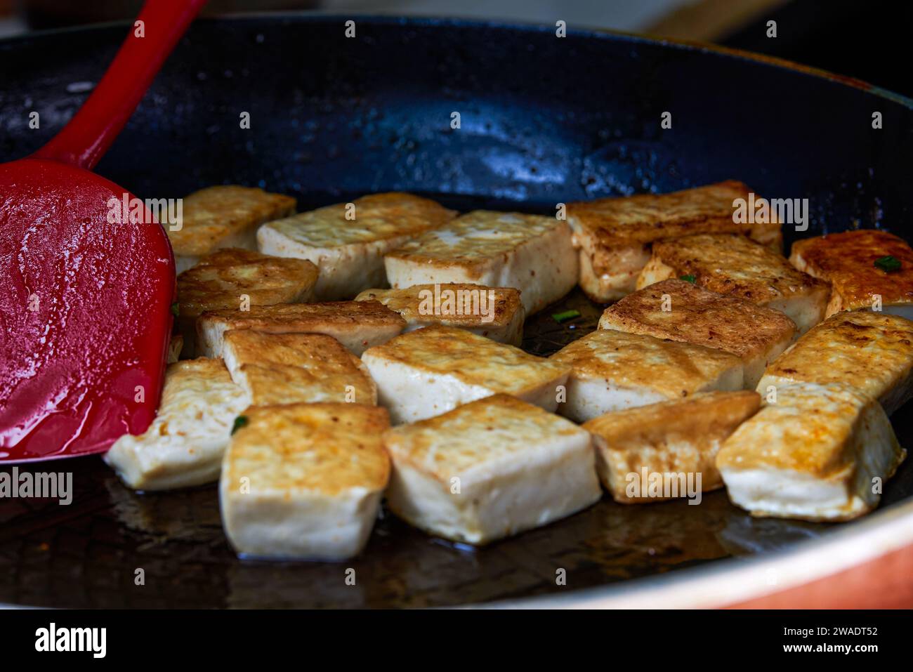 Fried tofu sold at a street food stall Stock Photo - Alamy