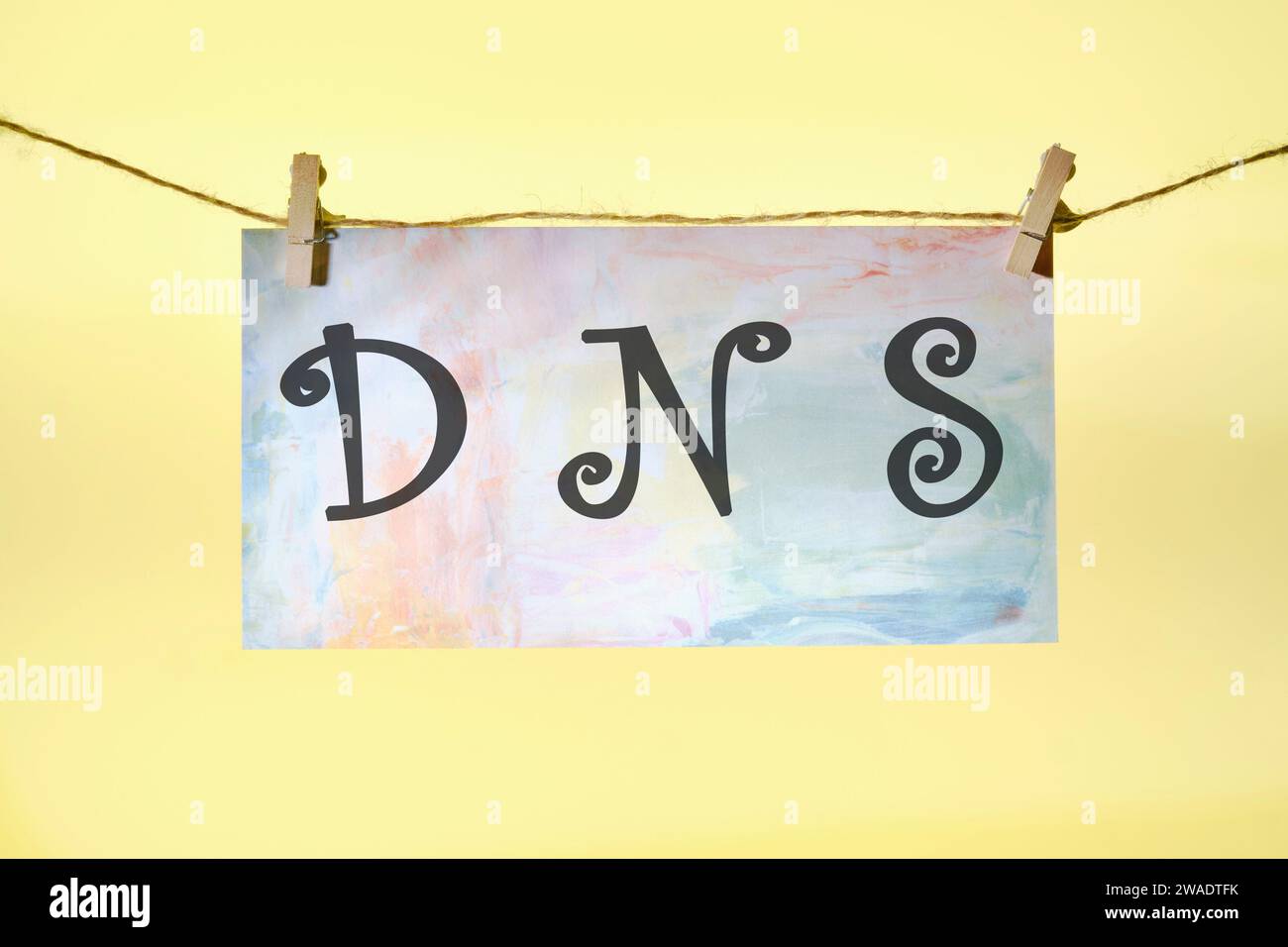 DNS -Domain Name Server lettering on colored paper hanging in front of ...