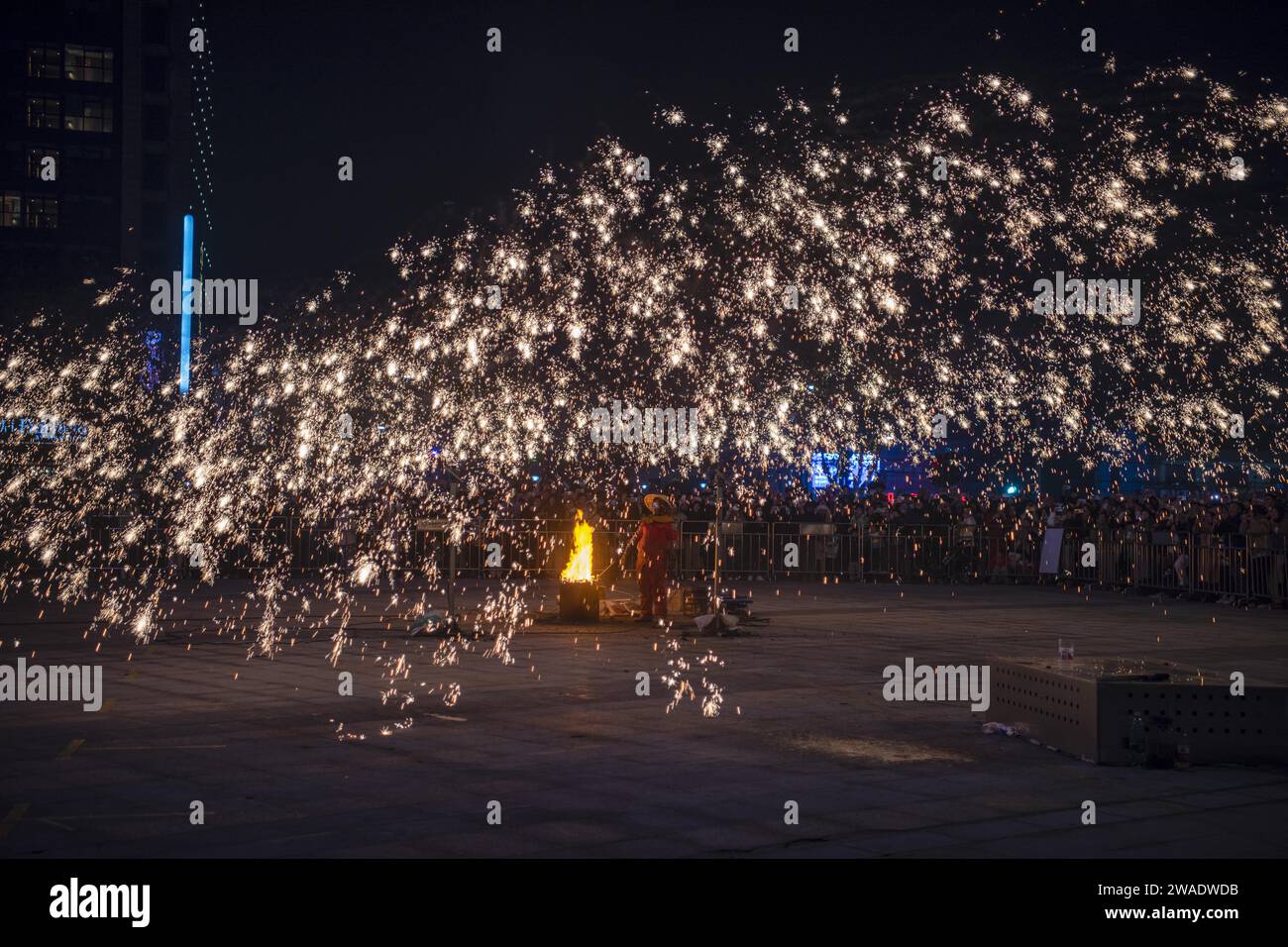 A traditional iron spraying known as Datiehua is staged in Yuyao City ...