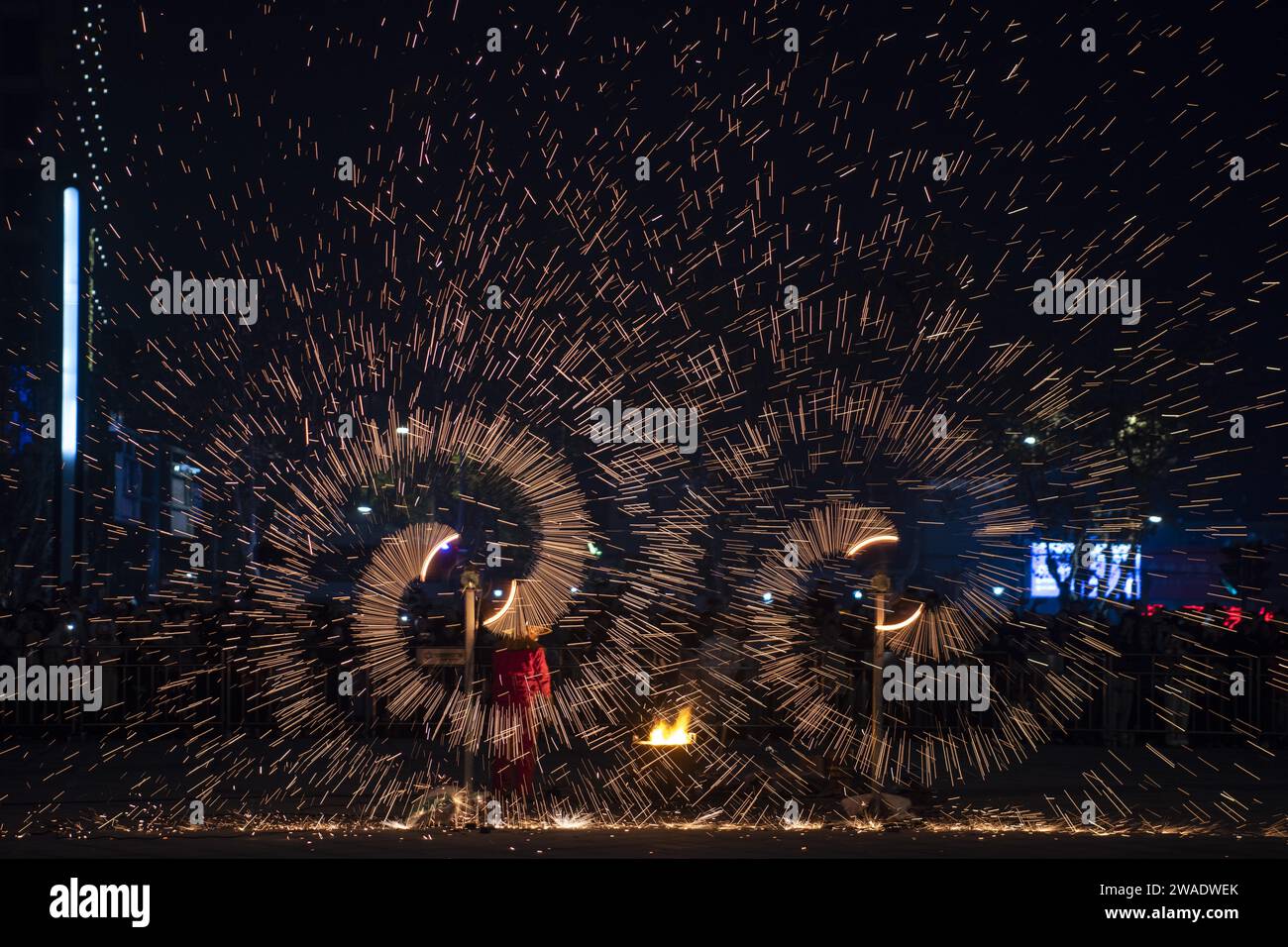 A traditional iron spraying known as Datiehua is staged in Yuyao City ...