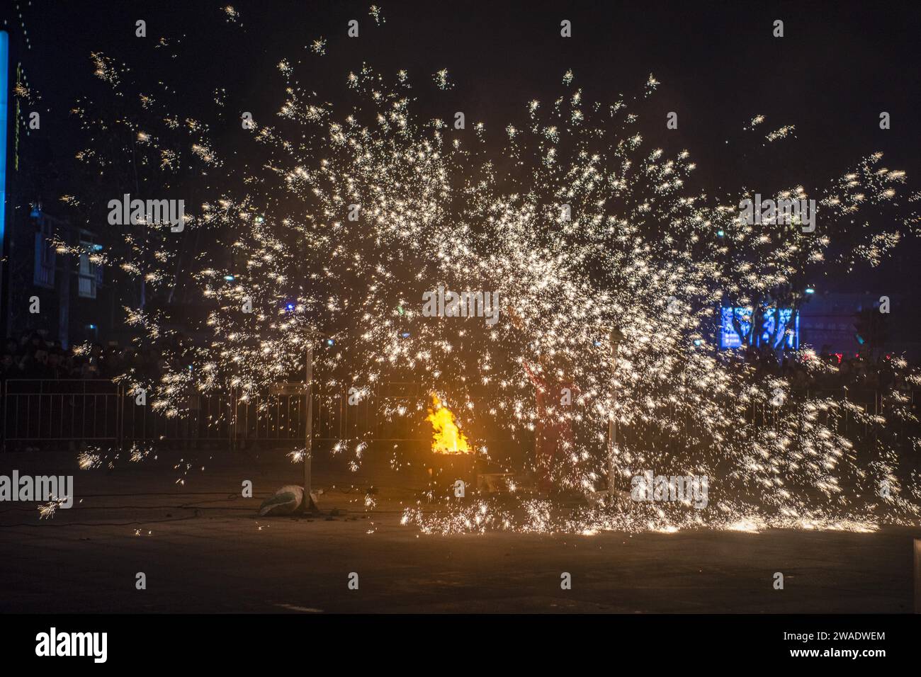 A traditional iron spraying known as Datiehua is staged in Yuyao City ...