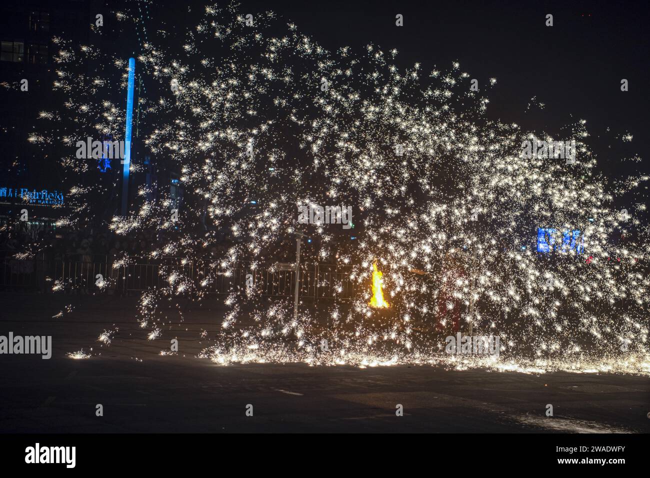 A traditional iron spraying known as Datiehua is staged in Yuyao City ...