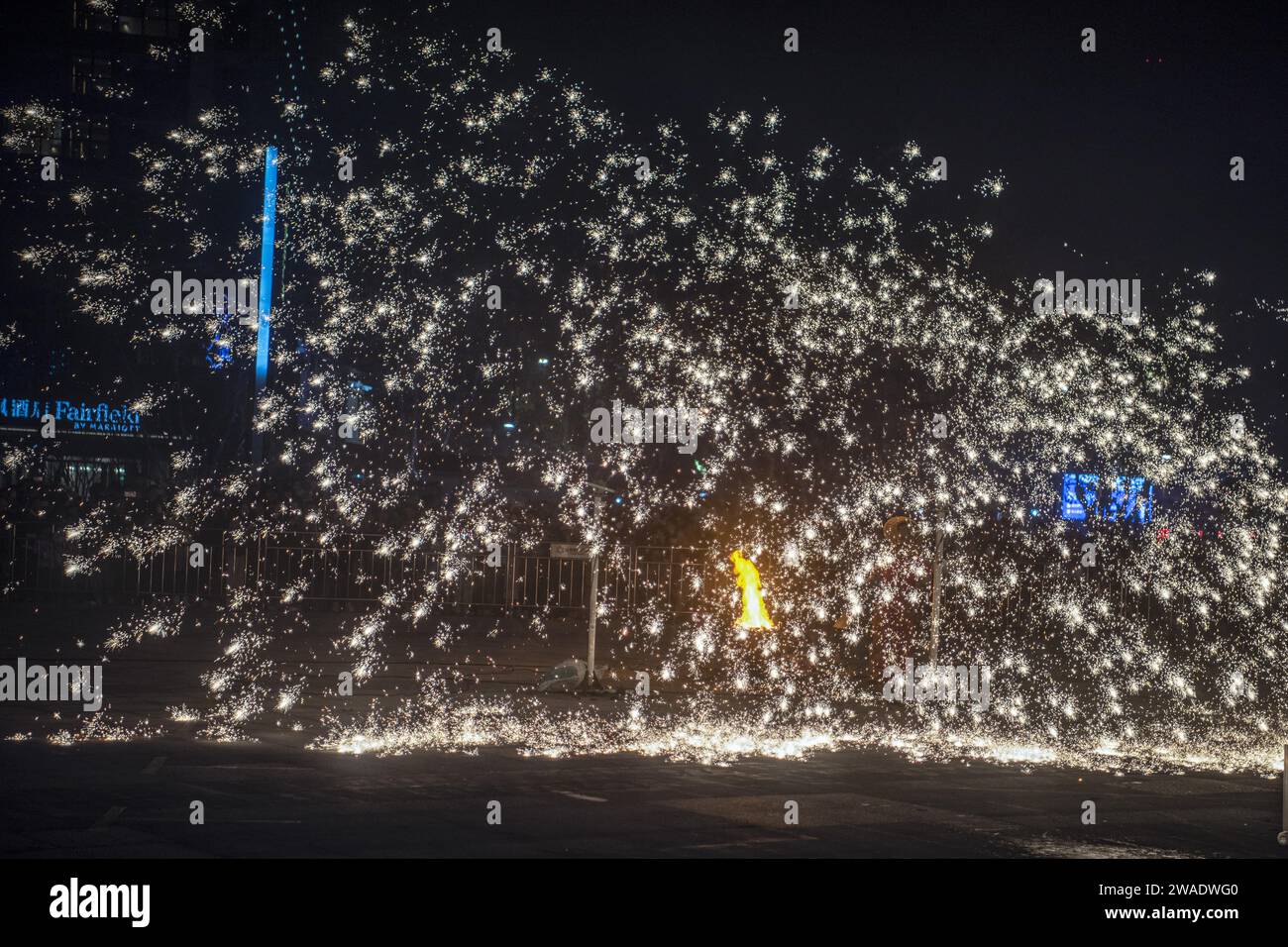 A traditional iron spraying known as Datiehua is staged in Yuyao City ...