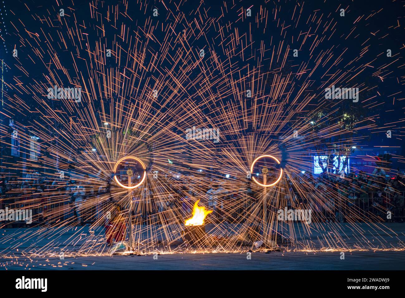 A traditional iron spraying known as Datiehua is staged in Yuyao City ...