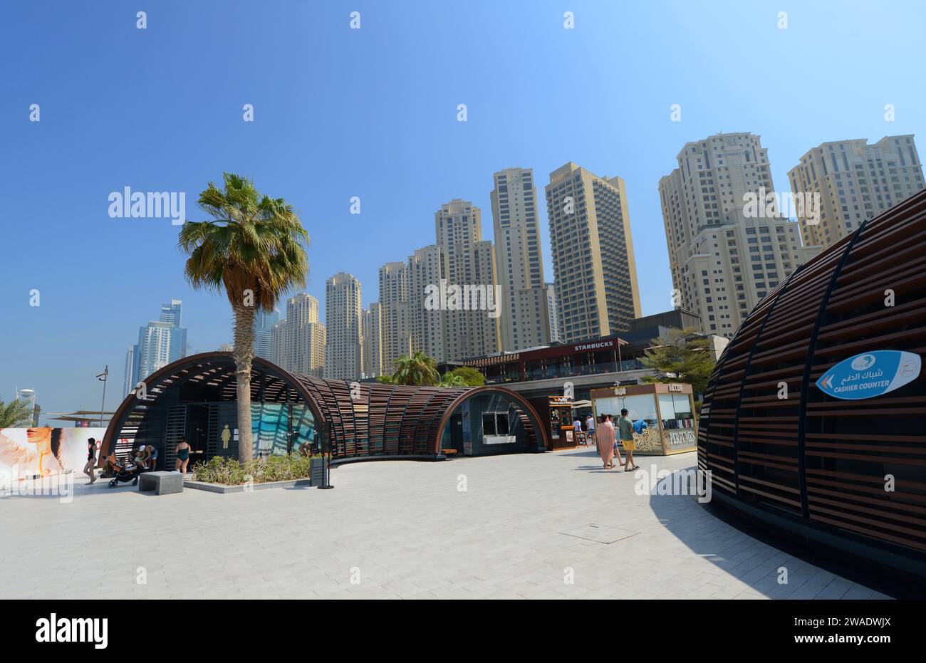 Restaurants and cafes along the beach promenade at the Marina beach in ...
