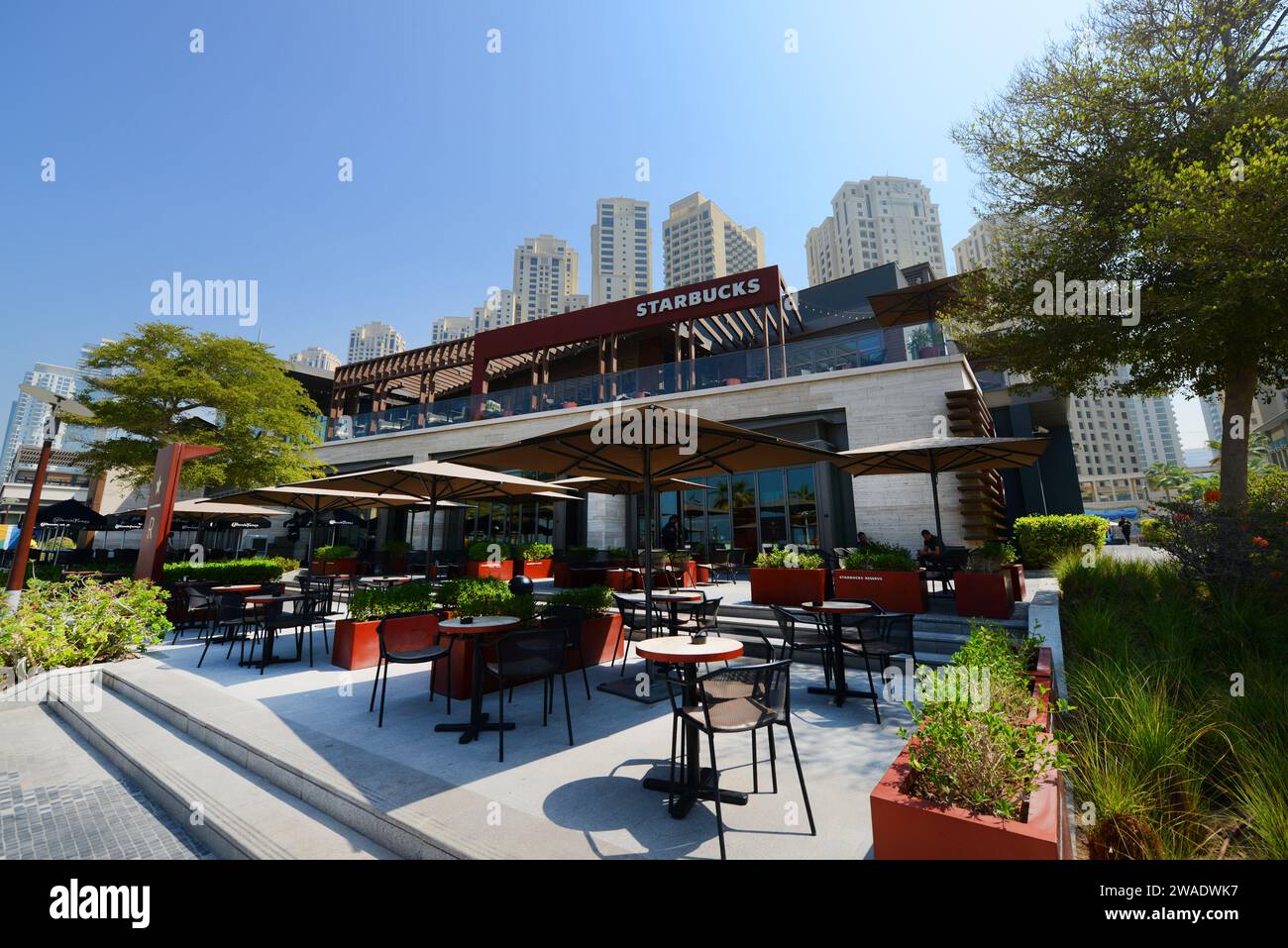 Restaurants and cafes along the beach promenade at the Marina beach in ...