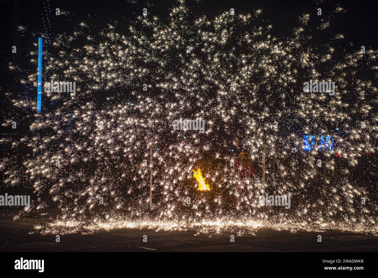 A traditional iron spraying known as Datiehua is staged in Yuyao City ...