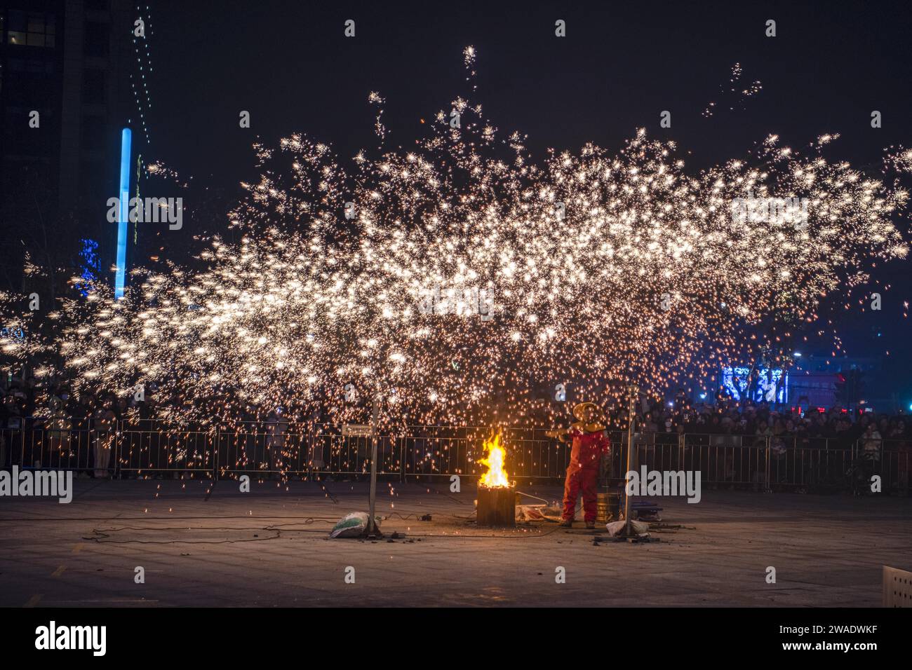 A traditional iron spraying known as Datiehua is staged in Yuyao City ...
