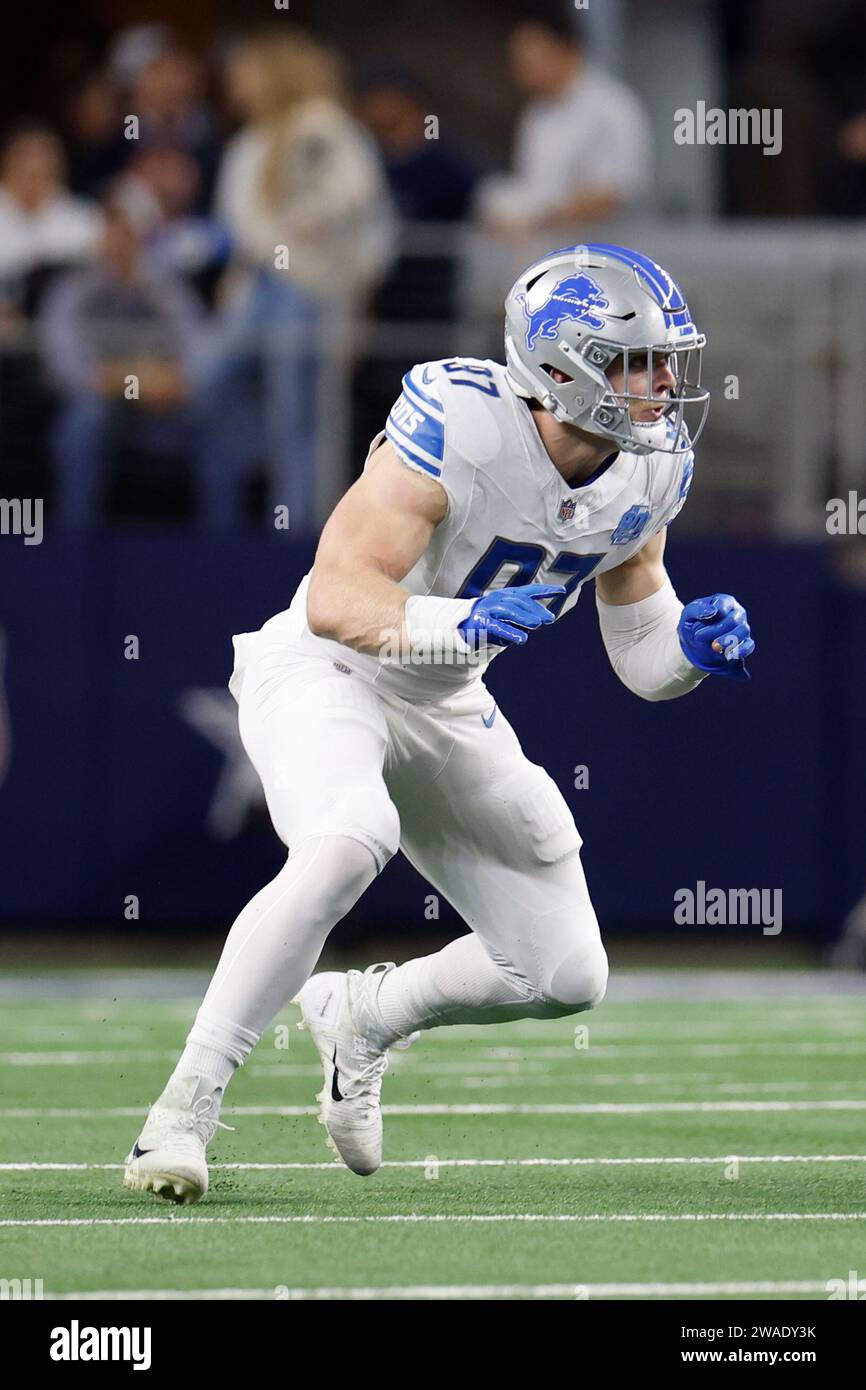 Detroit Lions defensive lineman Aidan Hutchinson (97) rushes during an NFL football game against ...