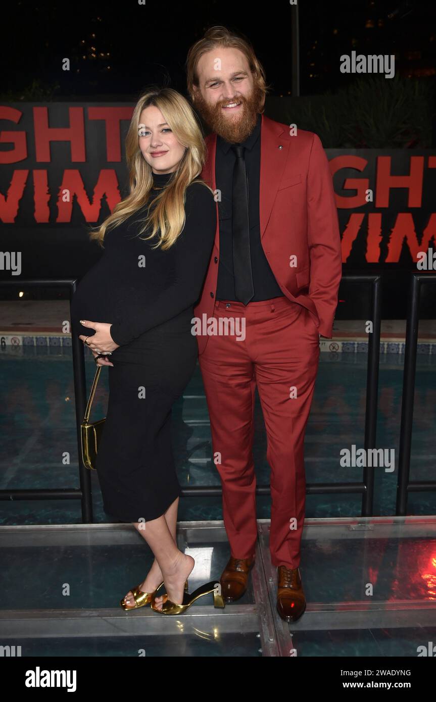 Meredith Hagner, left, and Wyatt Russel attend the premiere of "Night ...