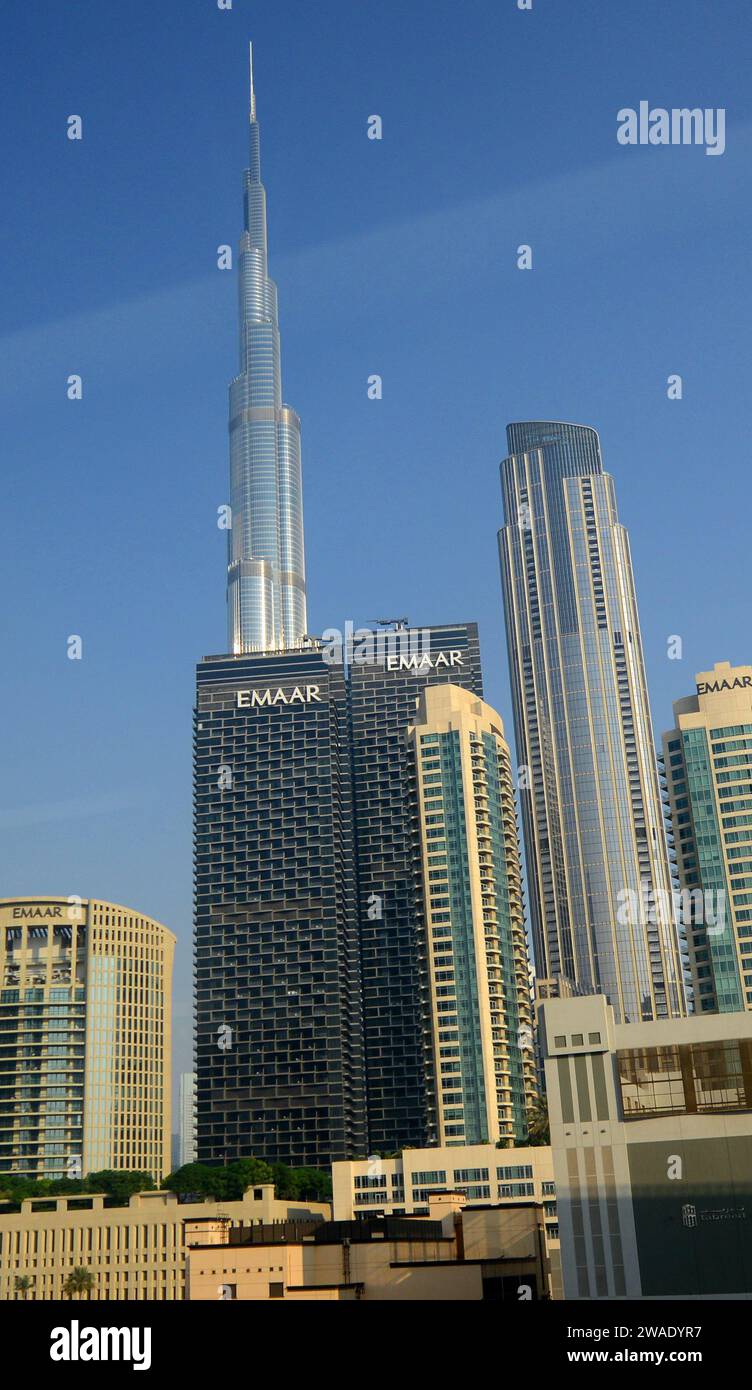 The Burj Khalifa skyscraper with other modern buildings around it in ...
