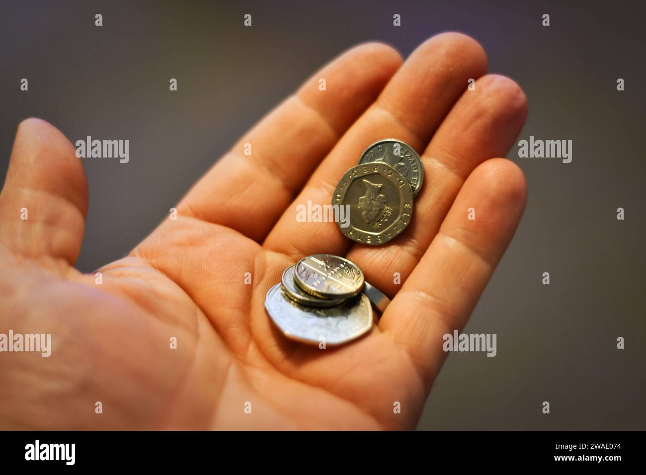 A hand full of cash Stock Photo - Alamy