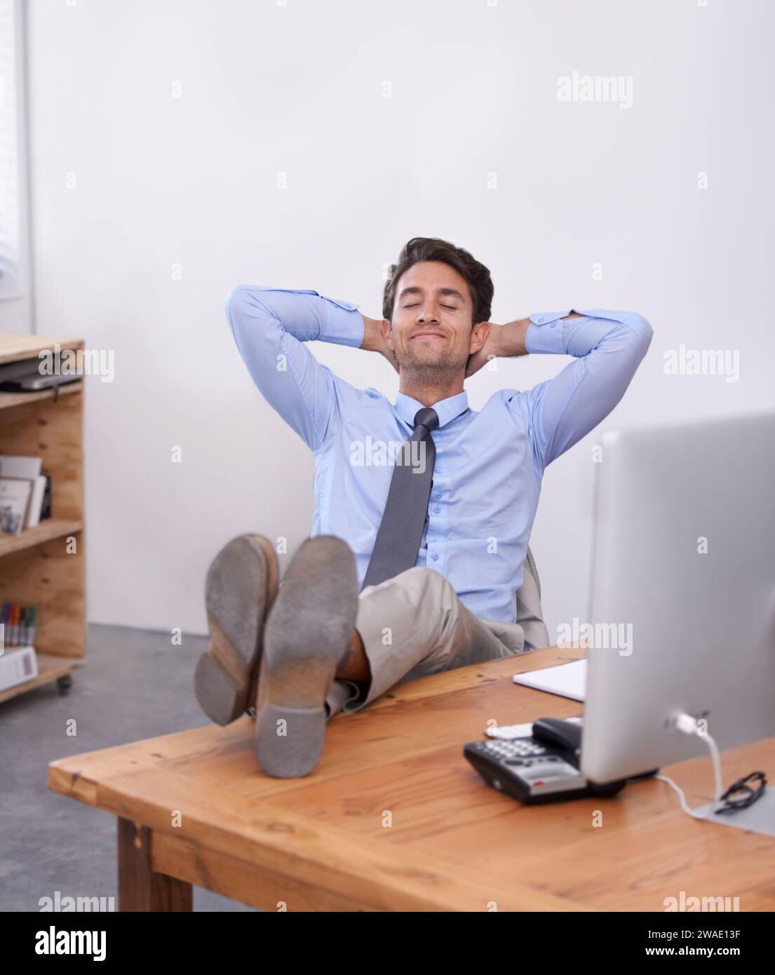 Nap, relax or happy man in office on break for mental health, pride or ...