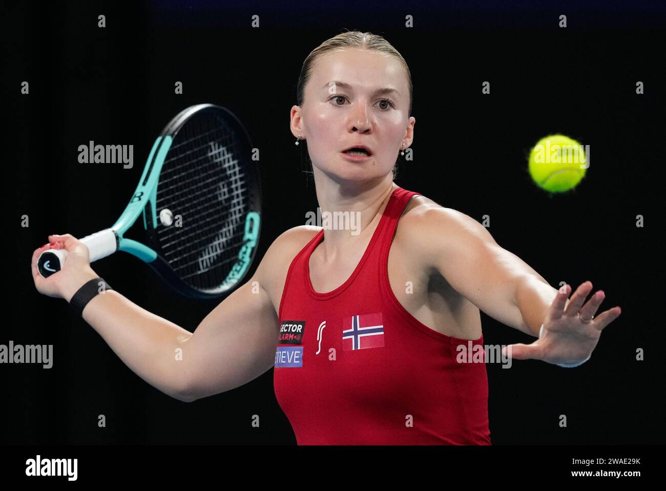 Norway's Malene Helgo plays a forehand return to Caroline Garcia of ...