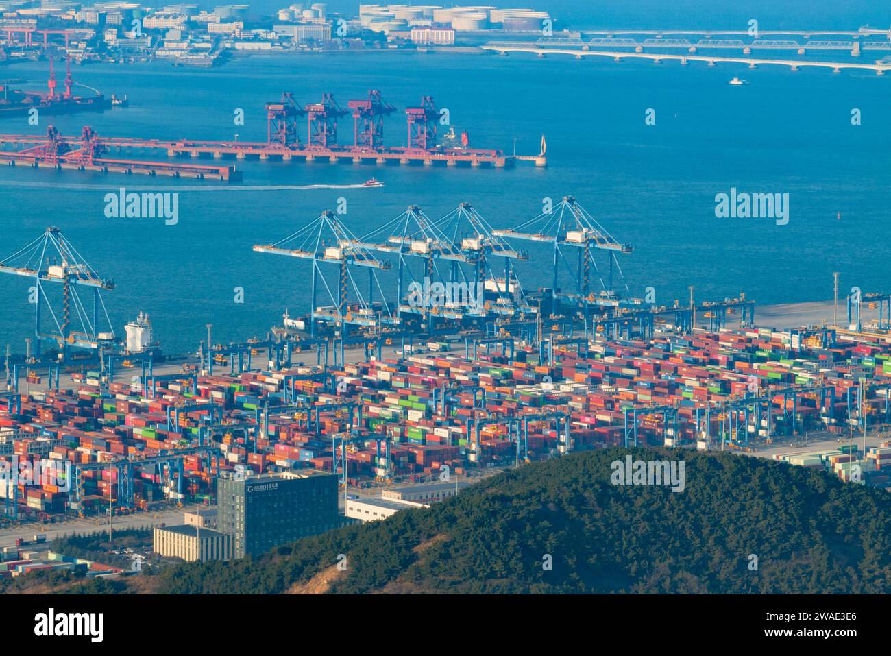 QINGDAO, CHINA - JANUARY 3, 2024 - A container ship sails into the port ...
