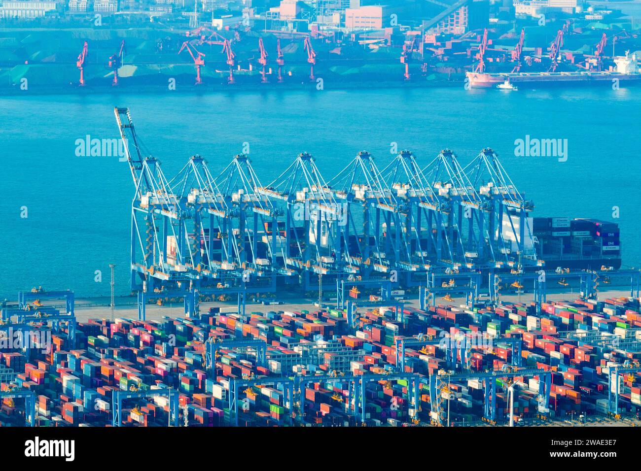 QINGDAO, CHINA - JANUARY 3, 2024 - A container ship sails into the port ...