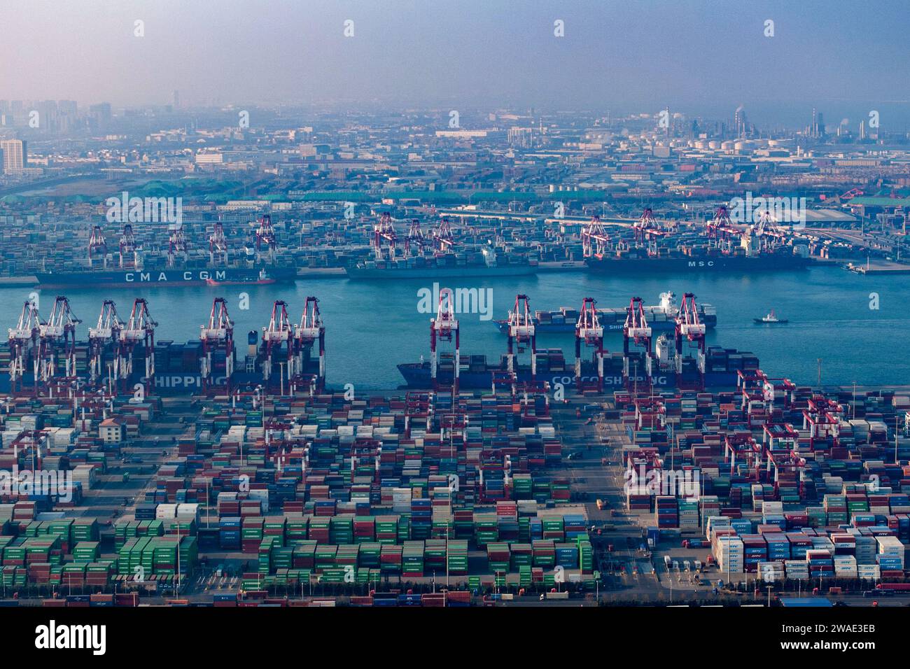 QINGDAO, CHINA - JANUARY 3, 2024 - A container ship sails into the port ...
