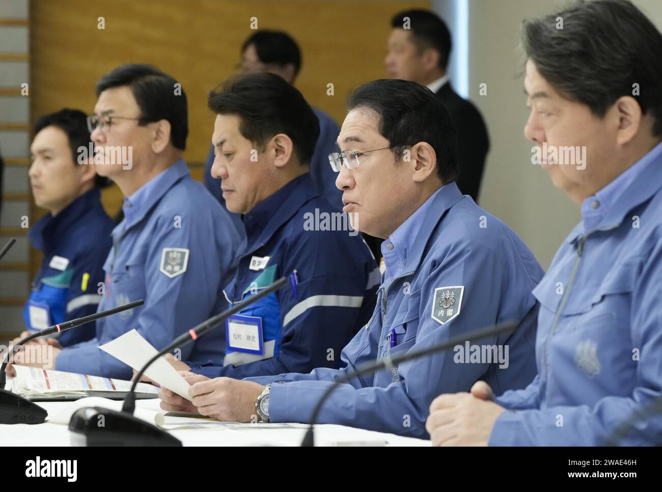 Japanese Prime Minister Fumio Kishida (2nd from R) speaks during a ...