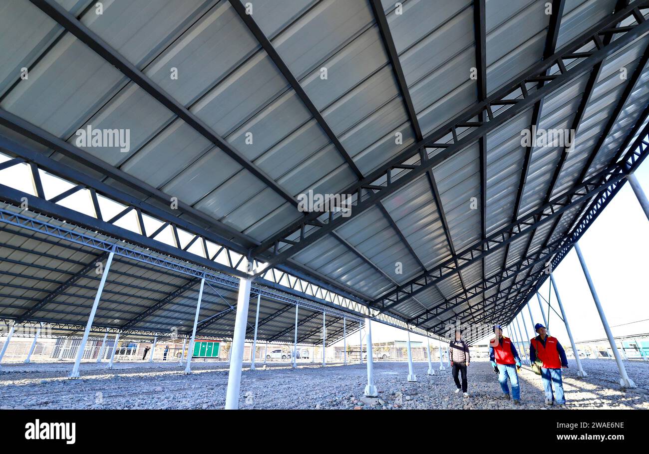 ZHANGYE, CHINA - JANUARY 4, 2024 - Power workers carry out safety ...