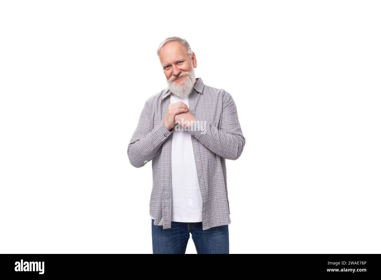 Well Groomed Gray Haired Senior Man With A Beard And Mustache In A