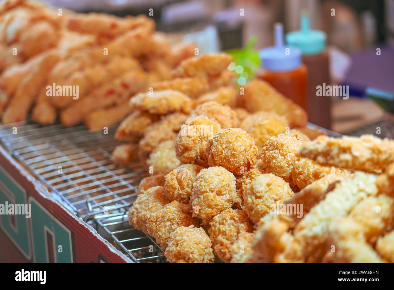 Meat snacks deep fried wings chicken legs on a street food stand Stock ...