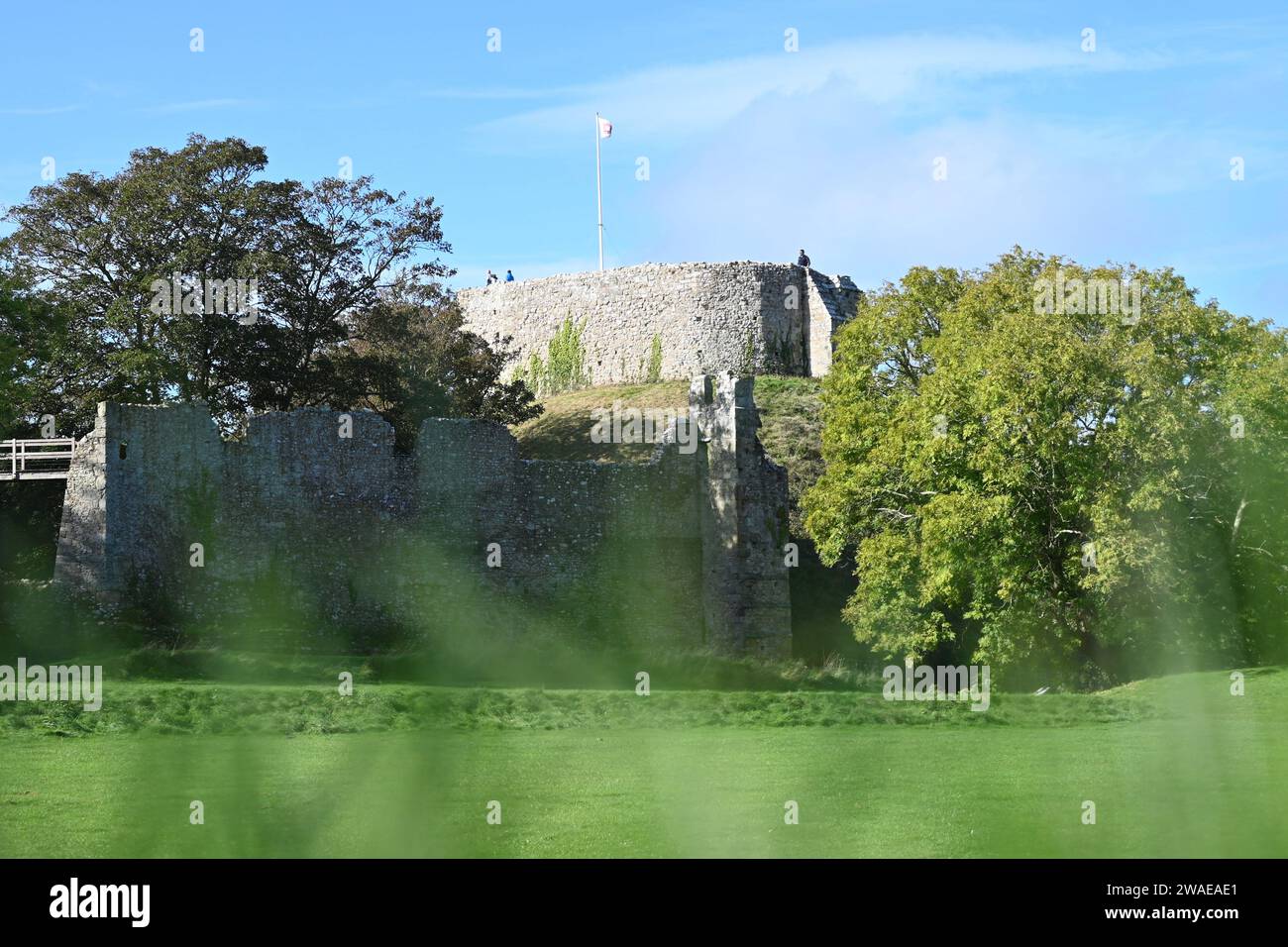 A scenic rural landscape featuring an array of trees and buildings ...