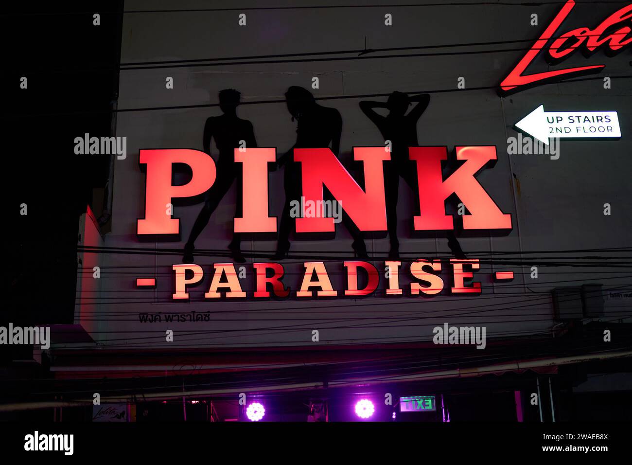 PHUKET, THAILAND - APRIL 25, 2023: close up shot of Pink Paradise sign ...