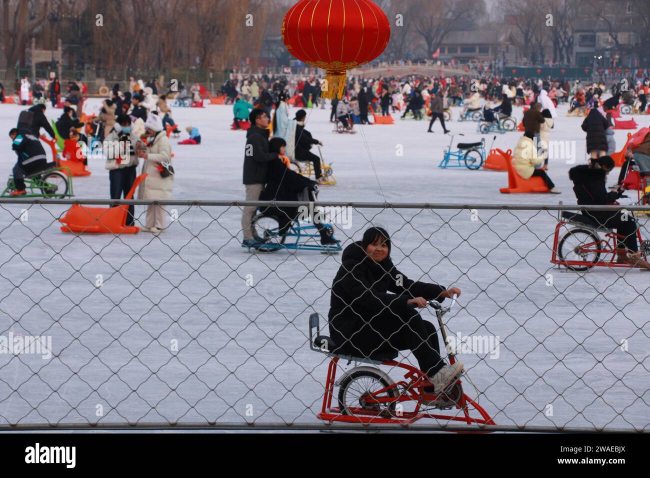 Tourists play at Shichahai ice rink in Beijing, China, 1 January, 2024 ...