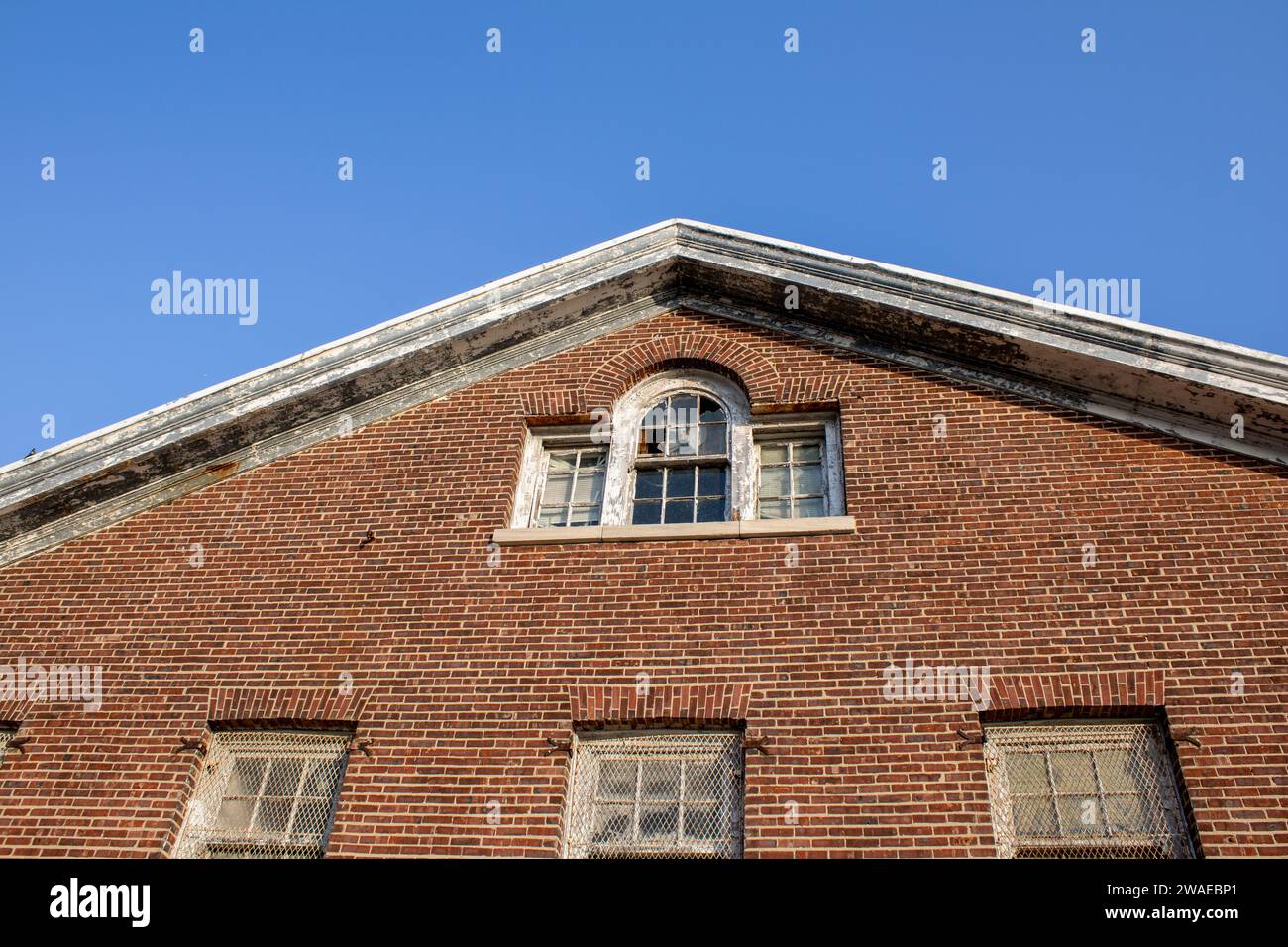 A low angle of a brick building at Hudson River in Brooklyn, New York ...