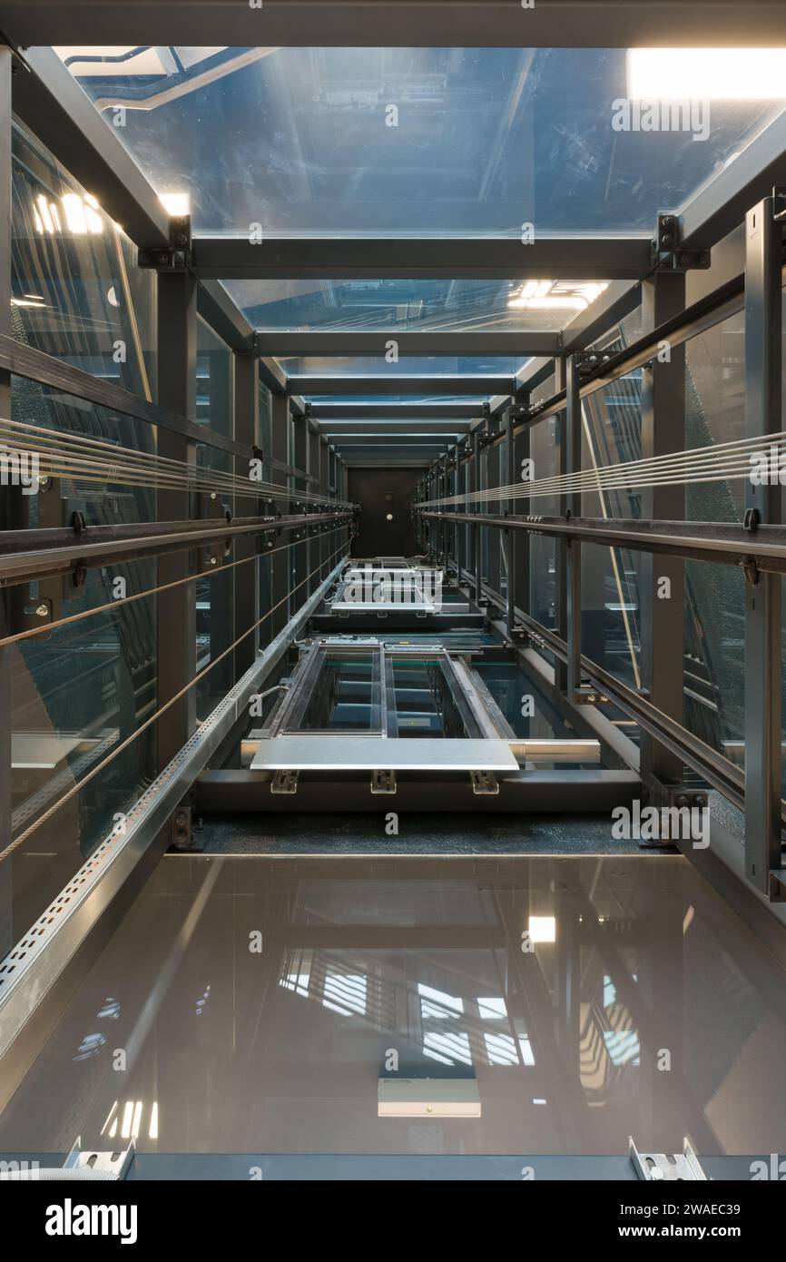Modern Elevator Shaft with Glass Panels Stock Photo - Alamy