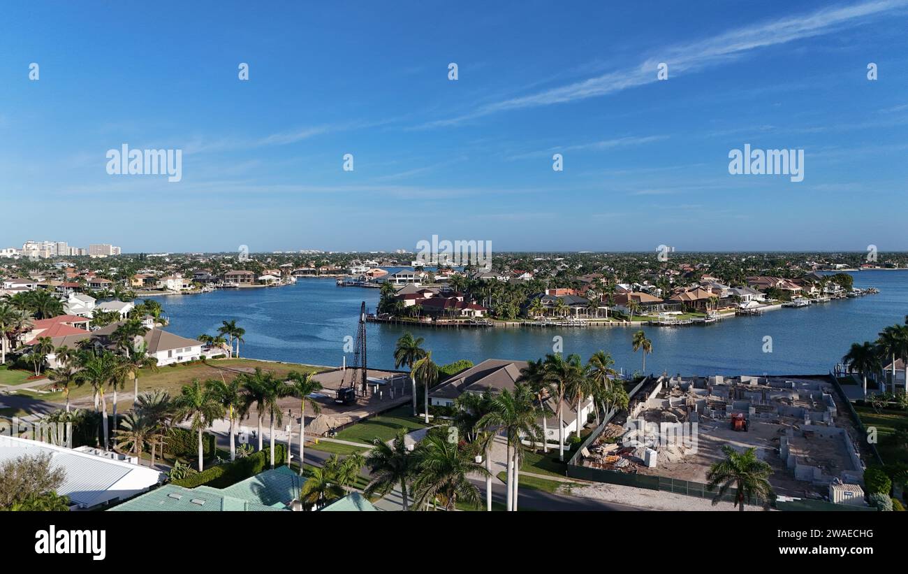 An aerial view of Marco Island, Florida with lush green vegetation and ...