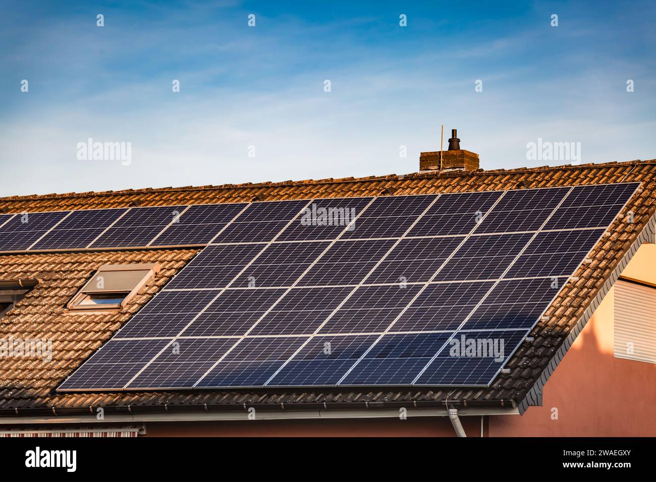 Photovoltaic panels on the roof of family house, solar panels ...
