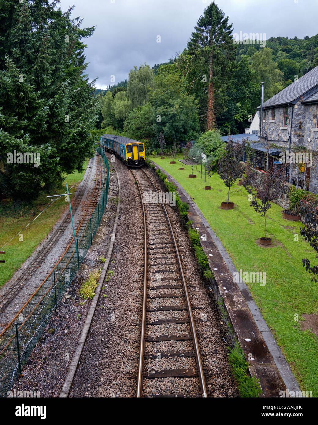 Welsh train arriving into station Stock Photo - Alamy