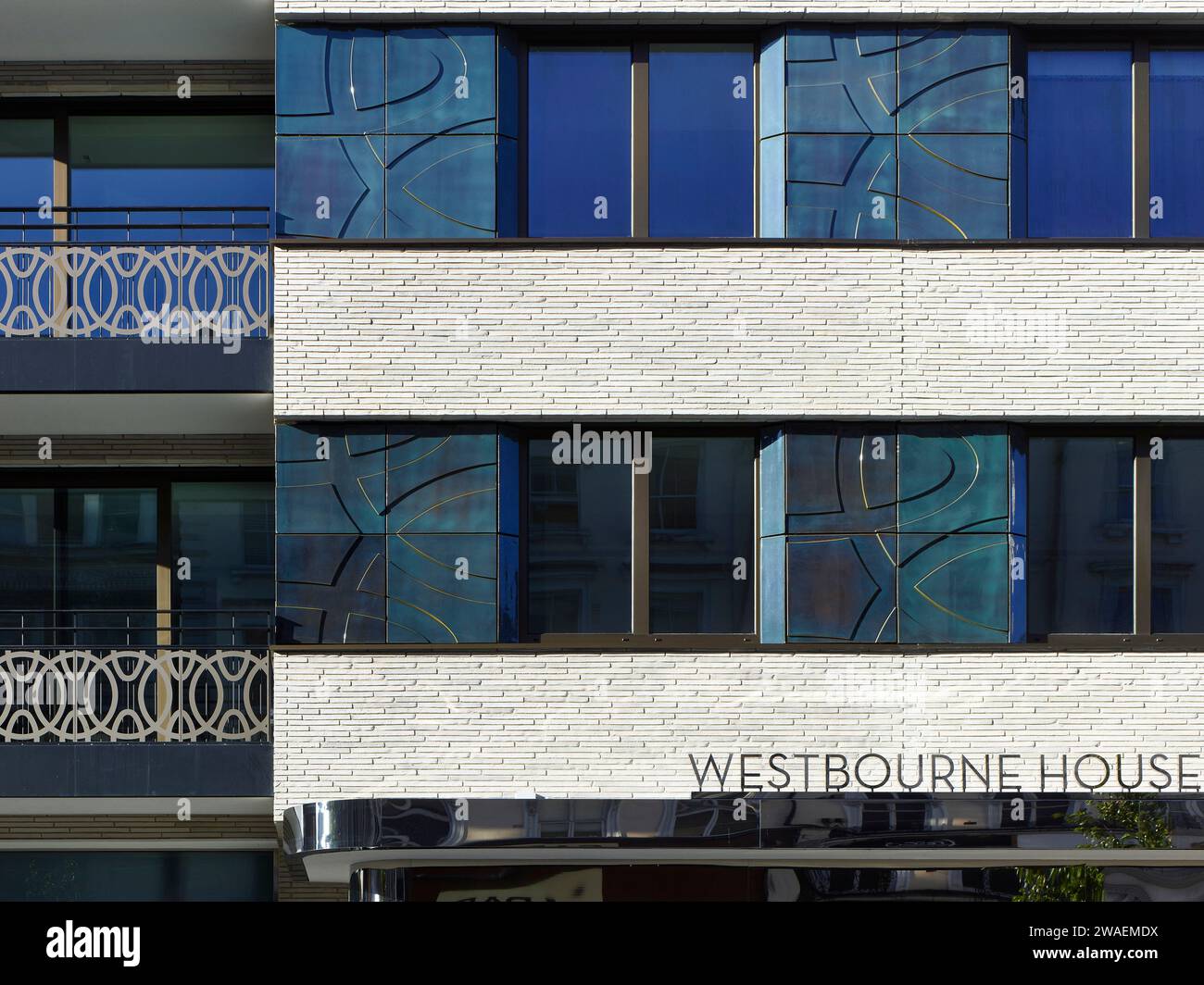 Facade detail with handmade brick and faience panel. Westbourne House ...
