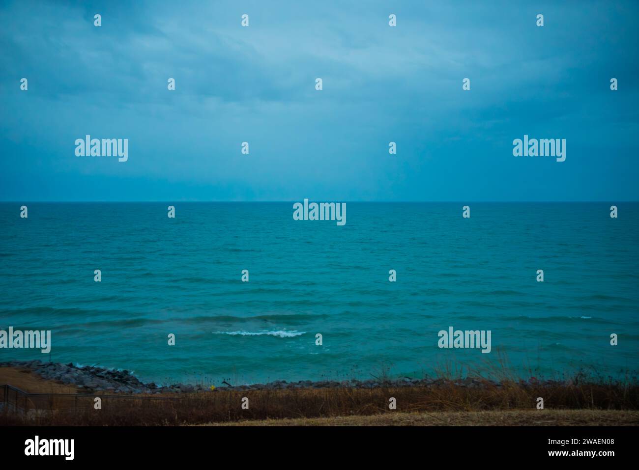 Serene empty beach gentle waves hi-res stock photography and images - Alamy