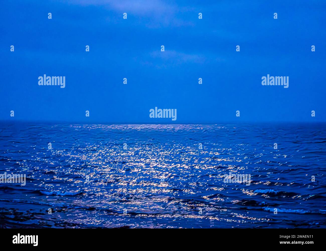 Serene empty beach gentle waves hi-res stock photography and images - Alamy