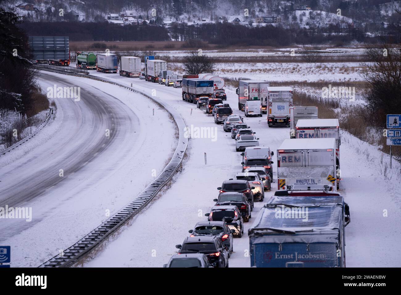 Jutland, Denmark, January 4, 2024, A number of trucks and cars are ...