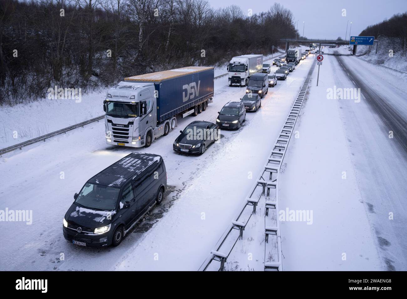 Jutland, Denmark, January 4, 2024, A number of trucks and cars are ...