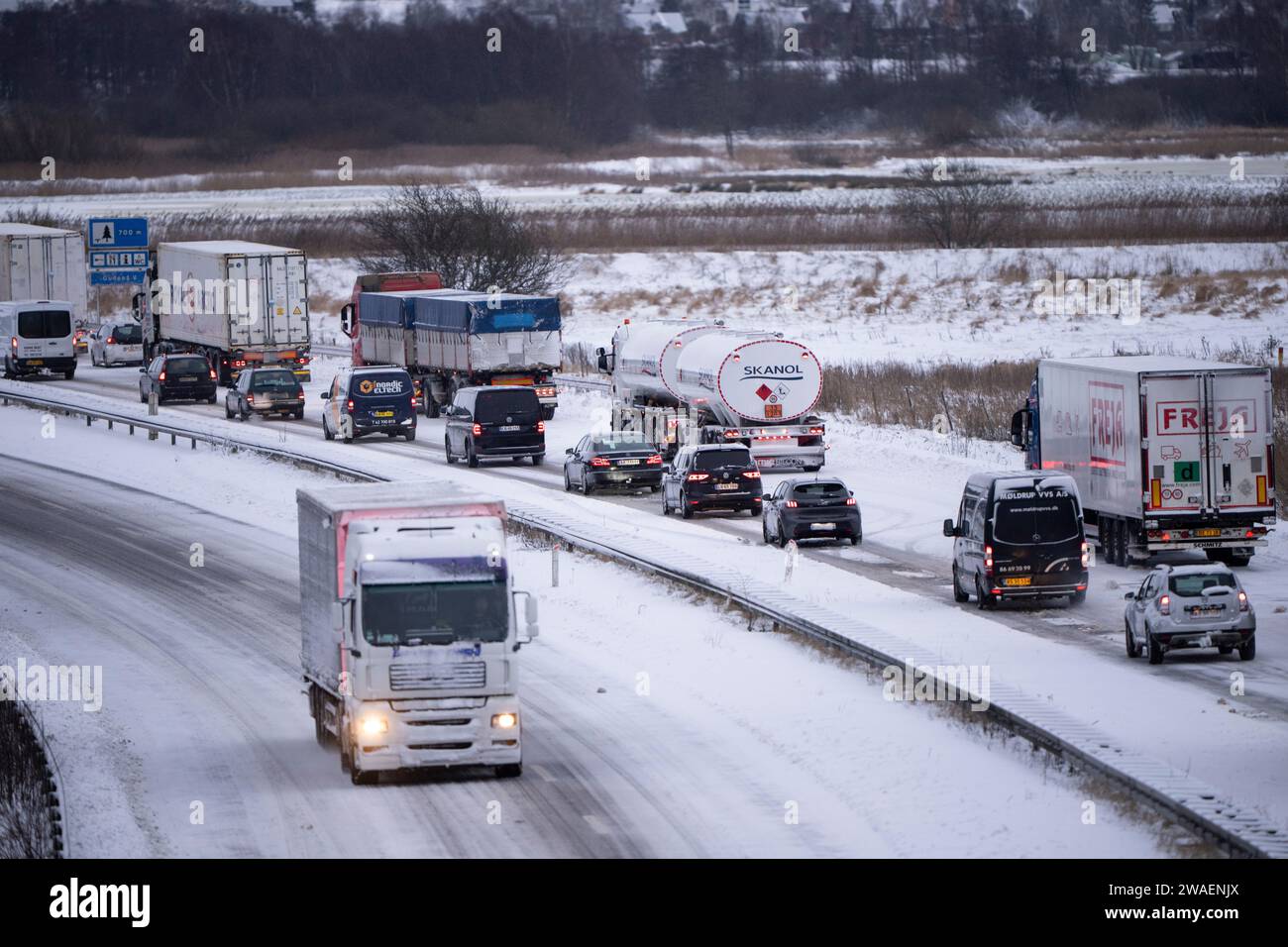Jutland, Denmark, January 4, 2024, A number of trucks and cars are ...