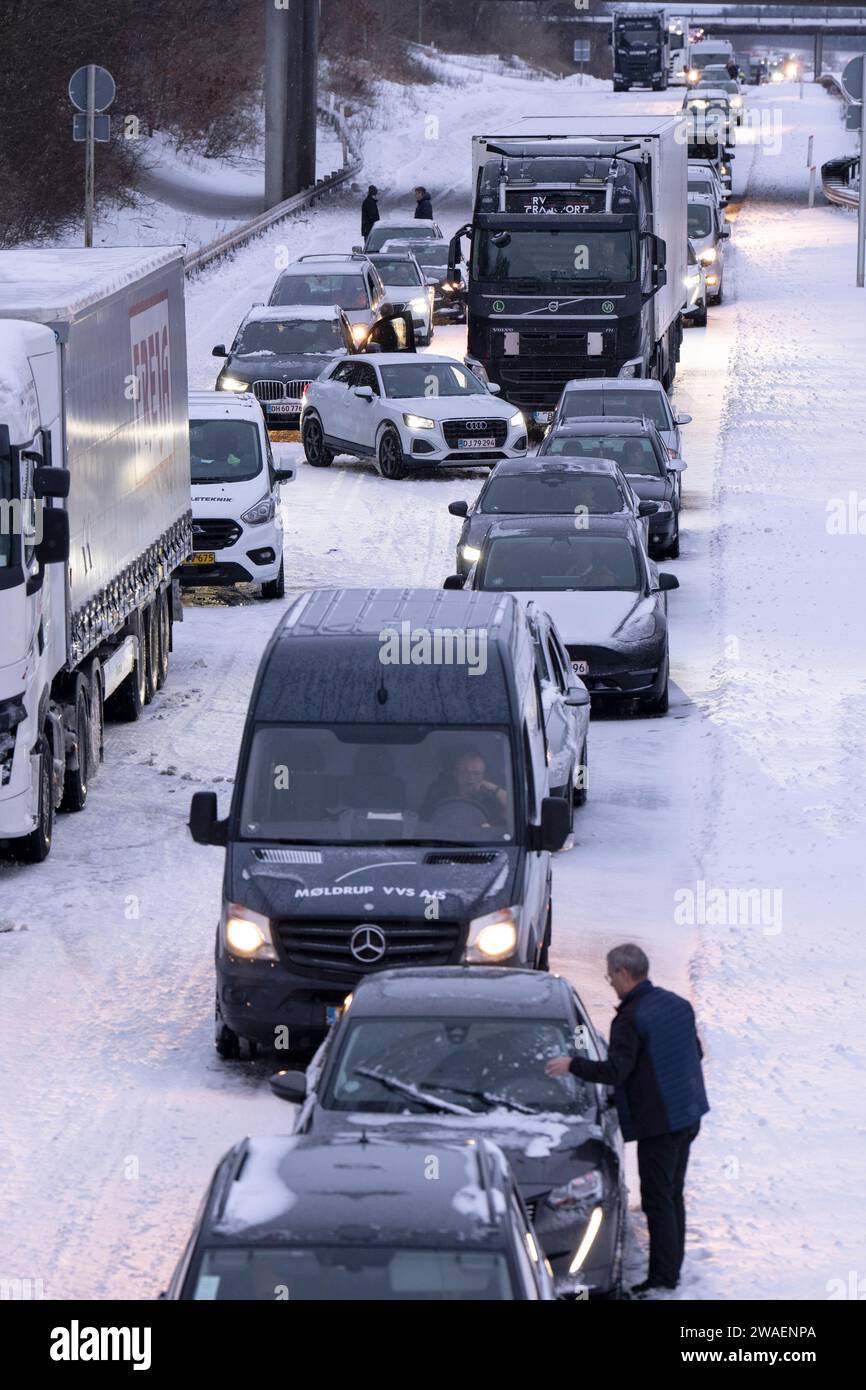 Jutland, Denmark, January 4, 2024, A number of trucks and cars are ...