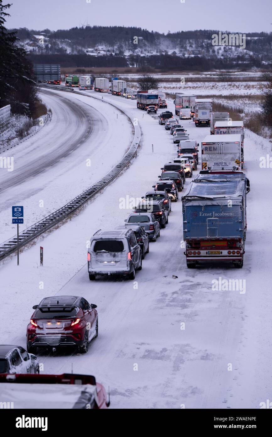 Jutland, Denmark, January 4, 2024, A number of trucks and cars are ...