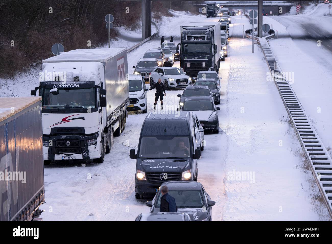 Jutland, Denmark, January 4, 2024, A number of trucks and cars are ...