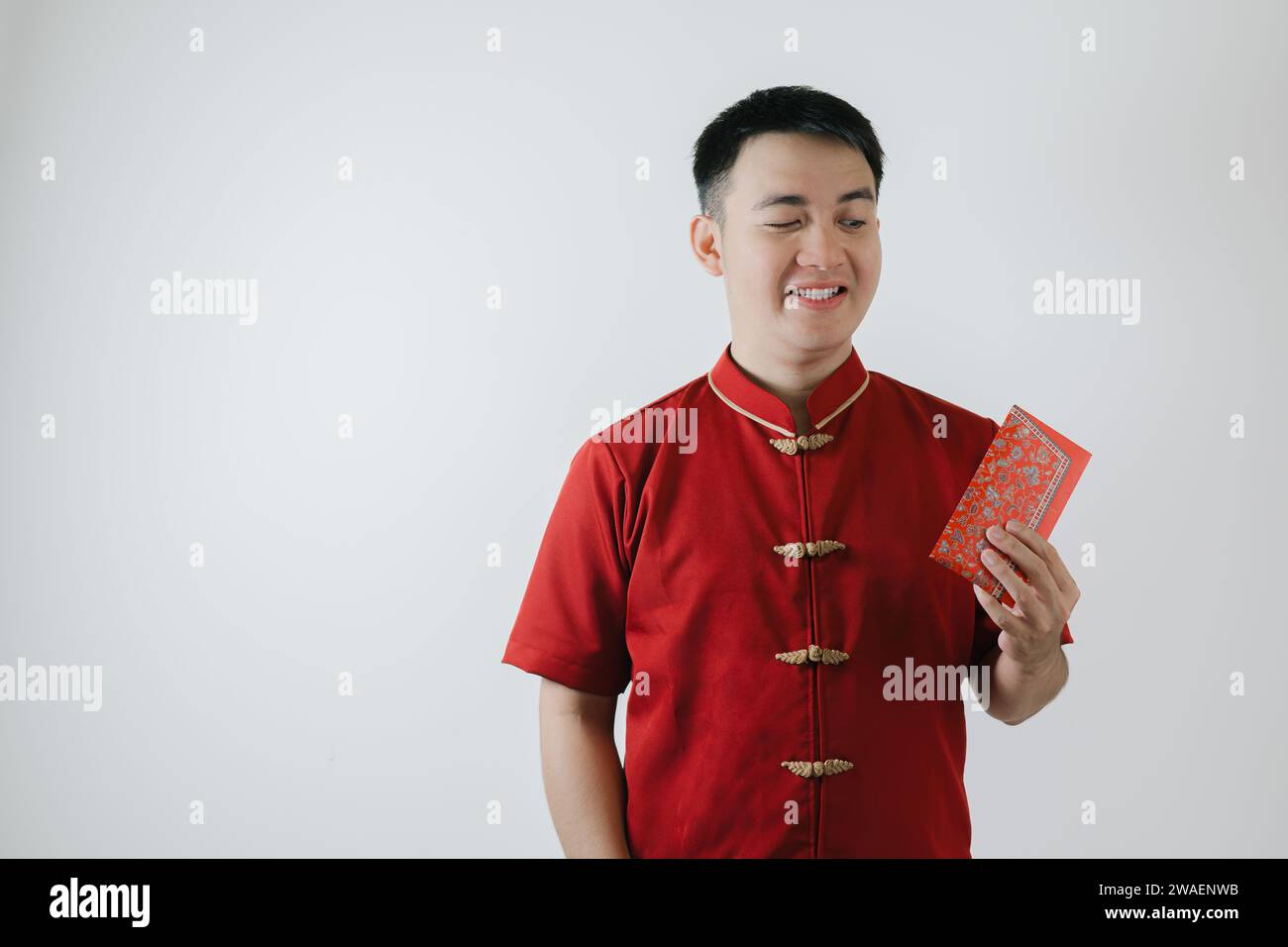 Smile face of young Asian man wearing Chinese traditional cloth called ...
