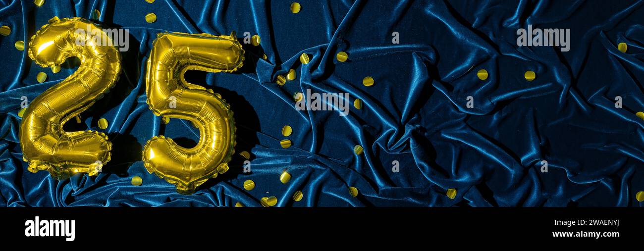 number twenty five, gold foil balloon number on blue velvet background ... number twenty five, gold foil balloon number on blue velvet background ...