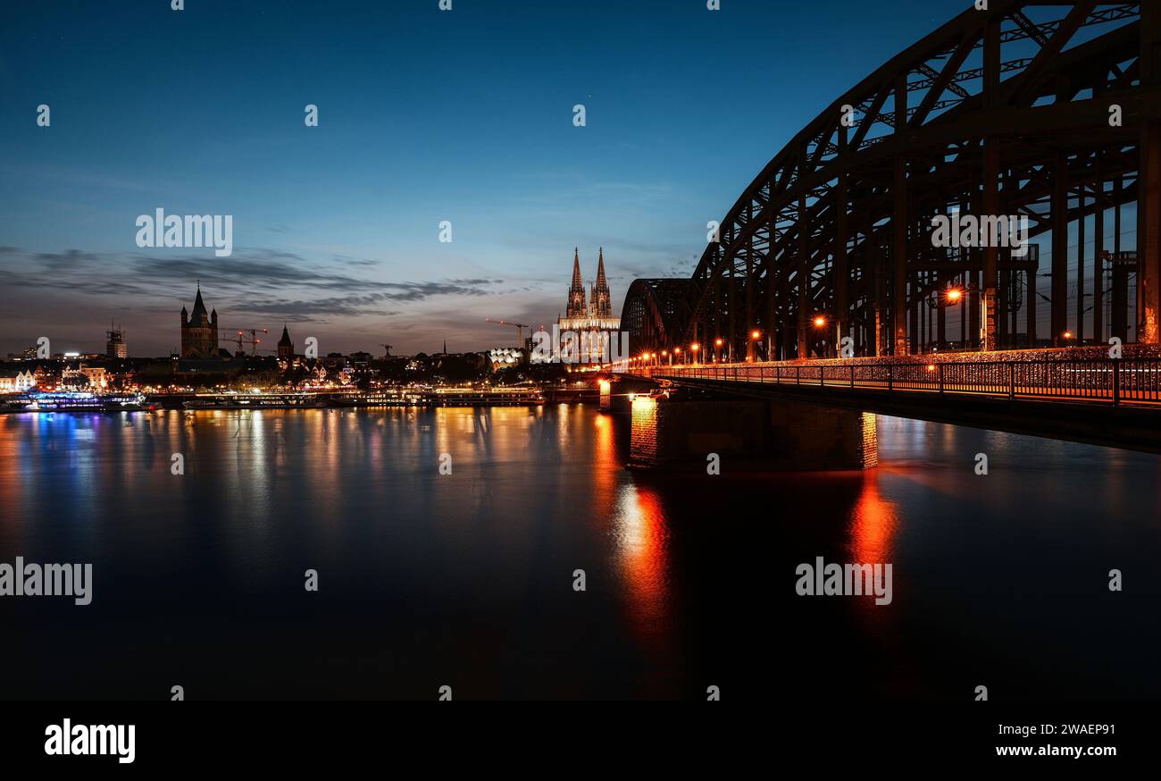 A stunning sunset in Cologne, Germany, illuminating the city's old town ...