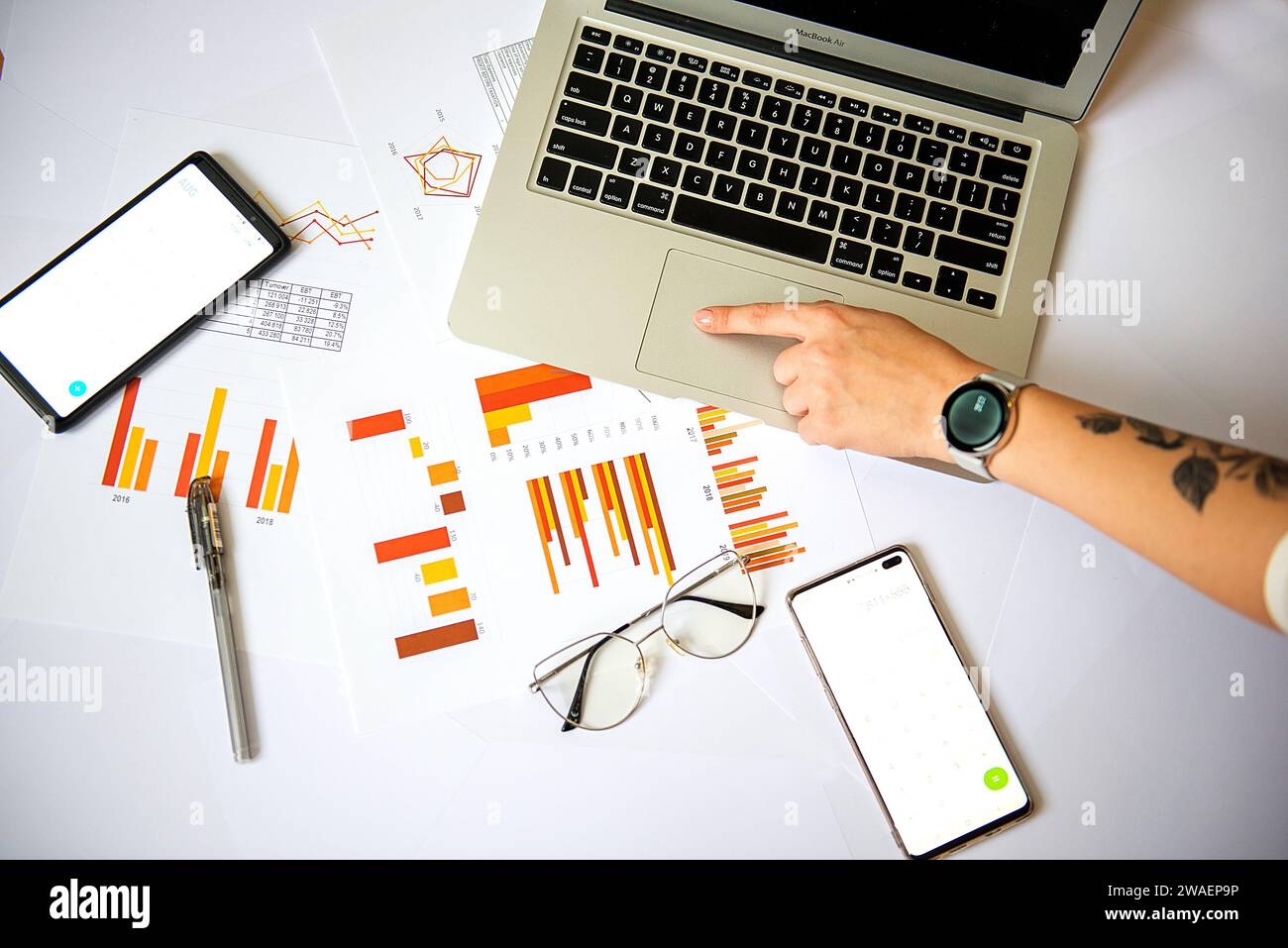 Working diligently hi-res stock photography and images - Alamy