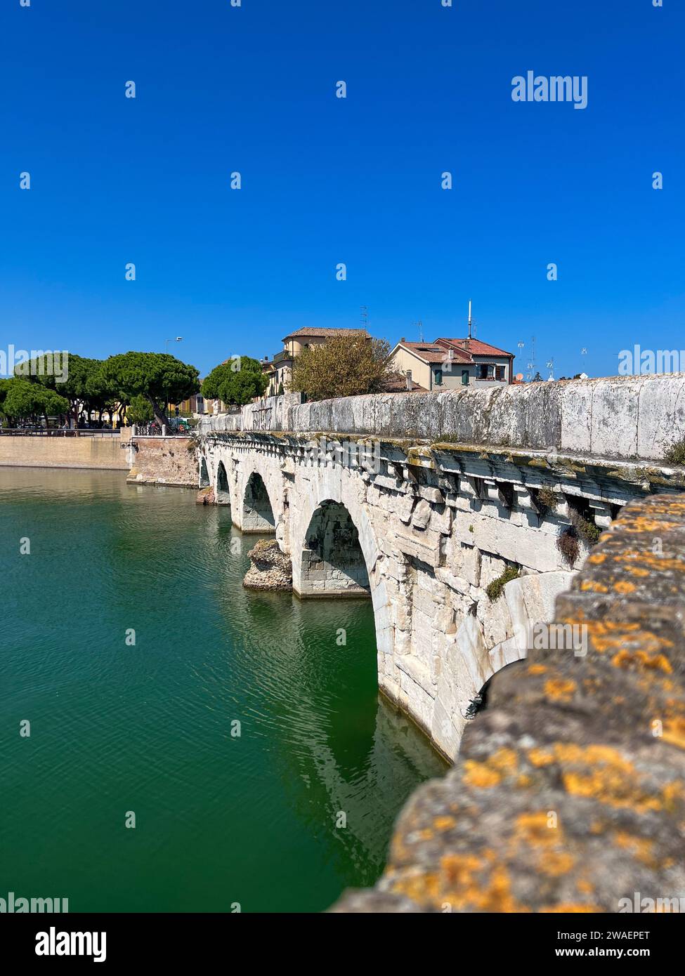 Small antique stone bridge over the river in the ancient city Stock ...