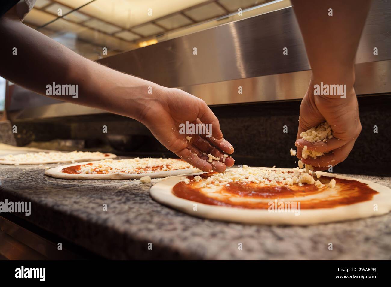 Italian chefs cooking traditional pizza hi-res stock photography and ...